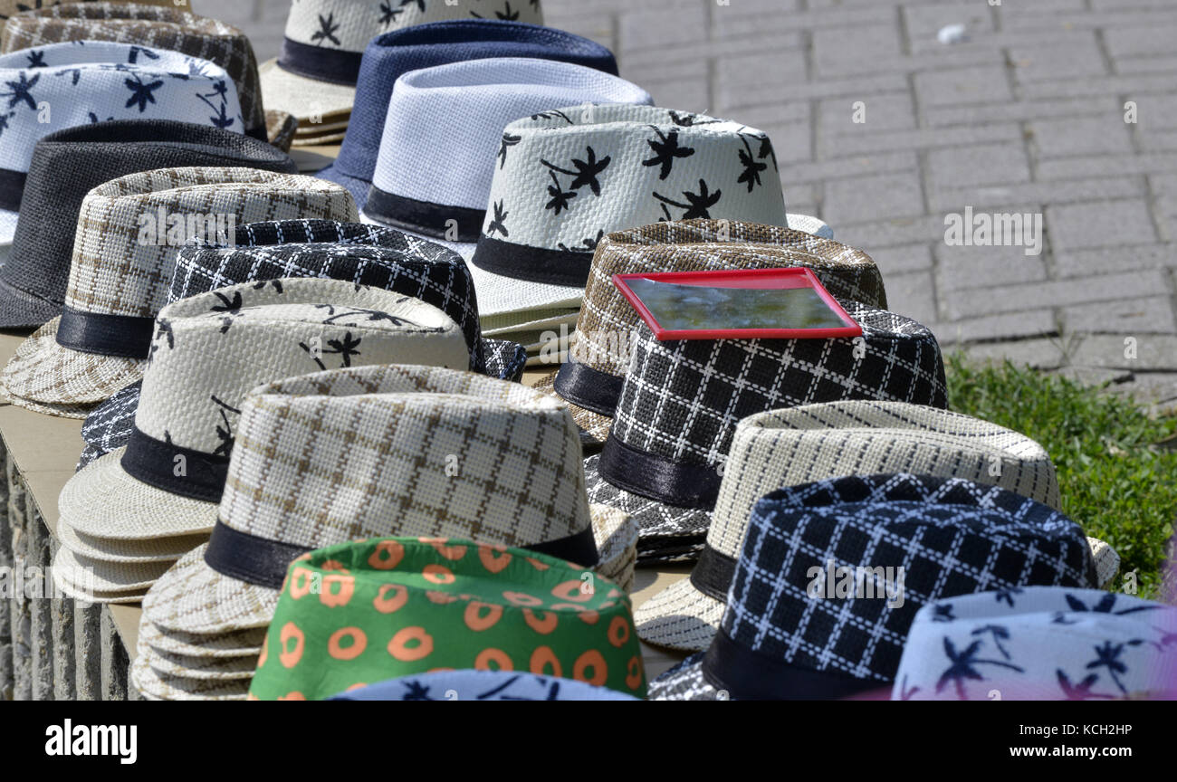 different hats for sale on the street,image of a Stock Photo - Alamy