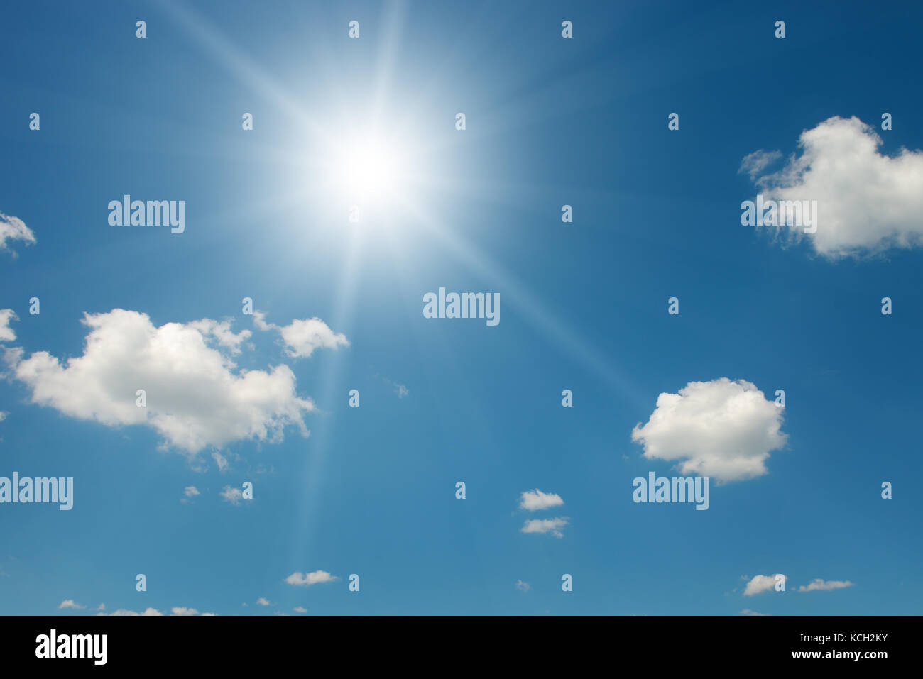 sun on beautiful blue sky Stock Photo - Alamy