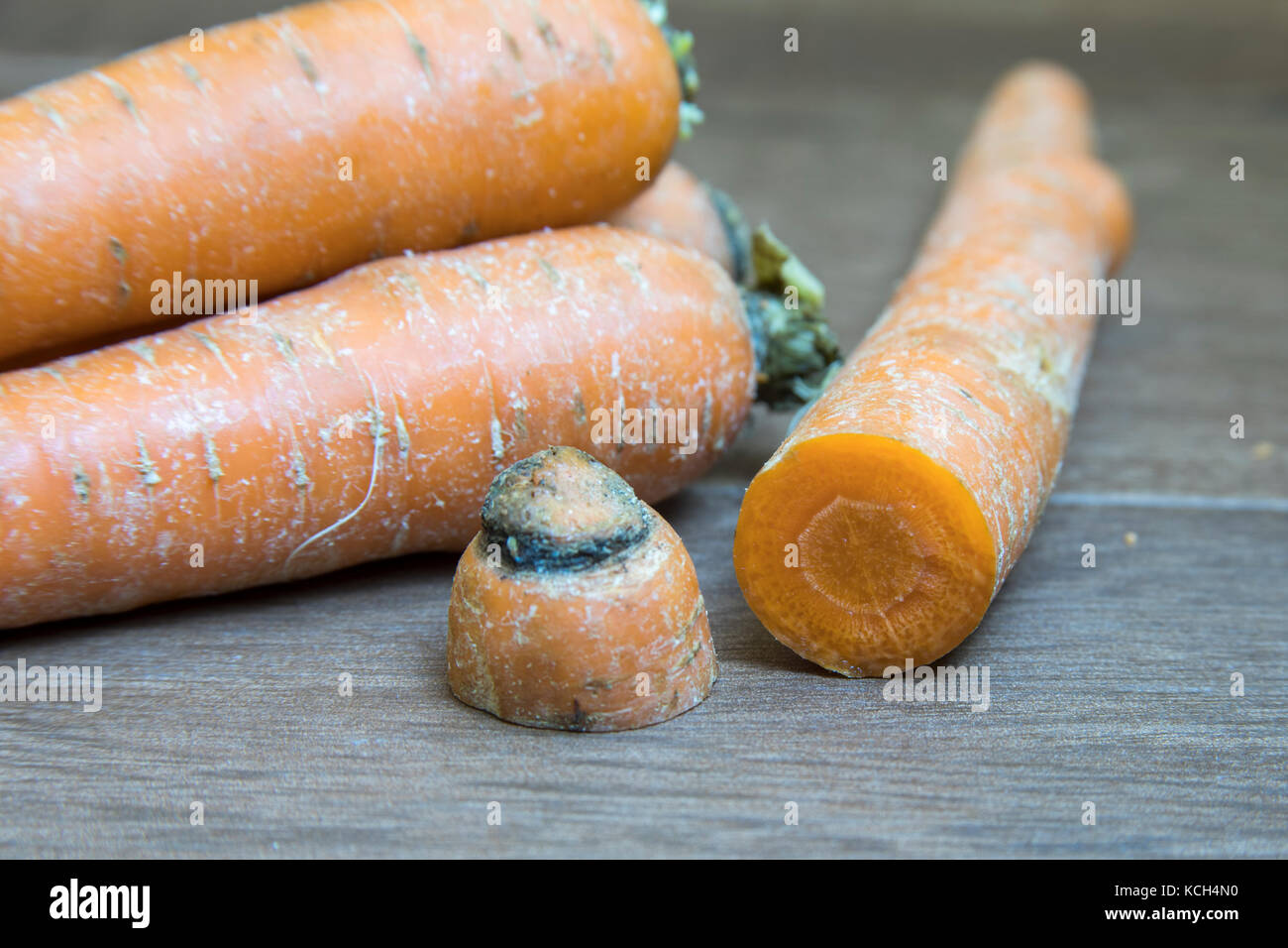 Whole fresh raw carrots on wooden boards Stock Photo - Alamy