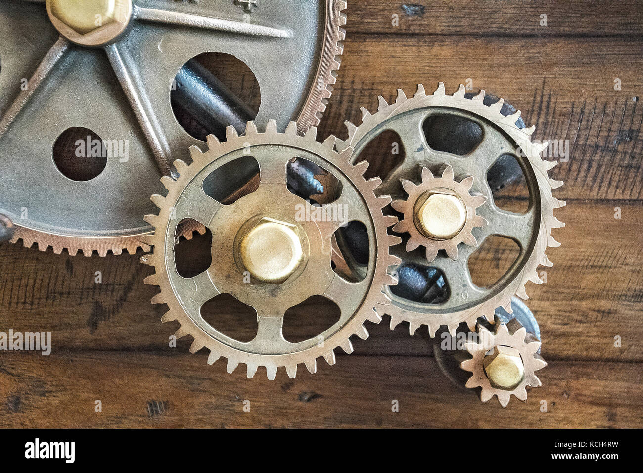 vintage machine gears on wood Stock Photo - Alamy