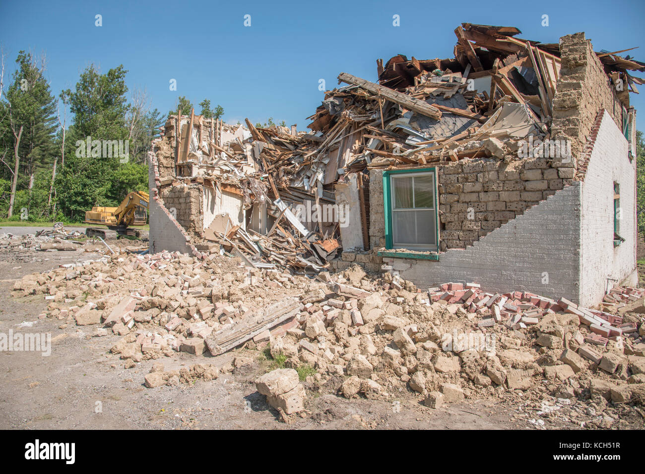 Debris from a demolished building lays strewn on the ground Stock Photo ...