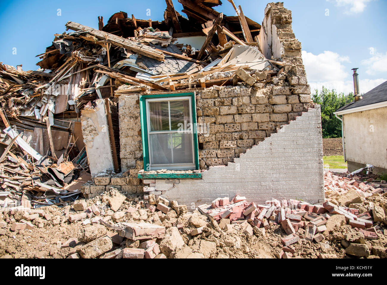 An old mud brick building lays in its rubble during demolition Stock ...