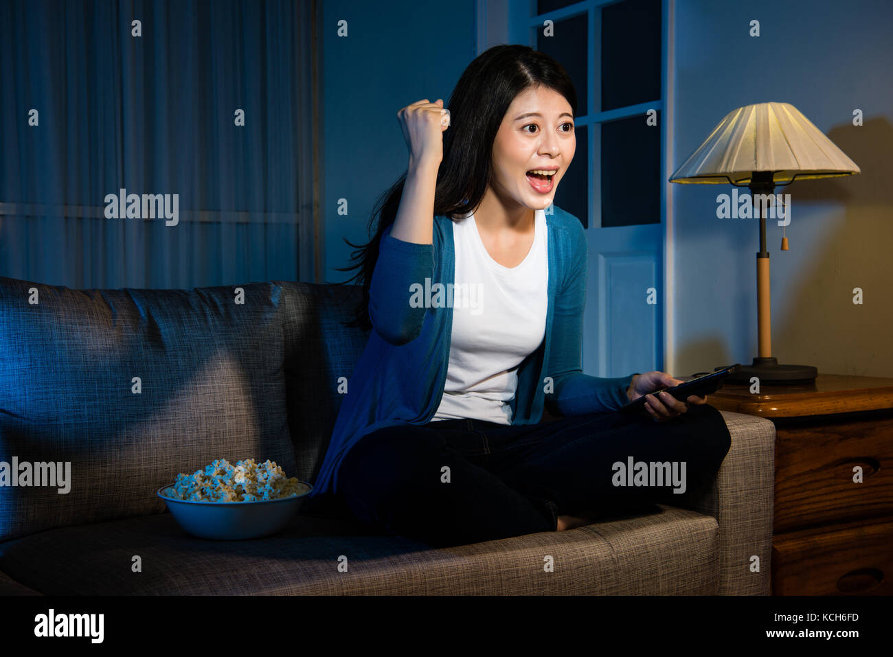 Woman sitting on football portrait hi-res stock photography and images ...