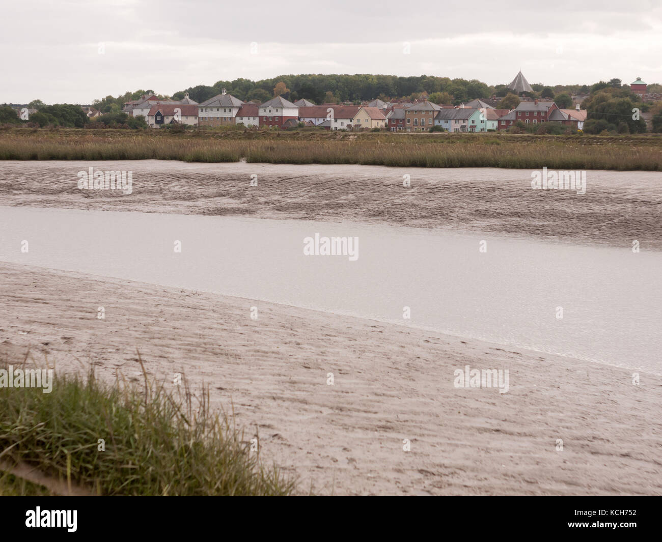 empty grey shallow water channel stream river outside with horizon ...