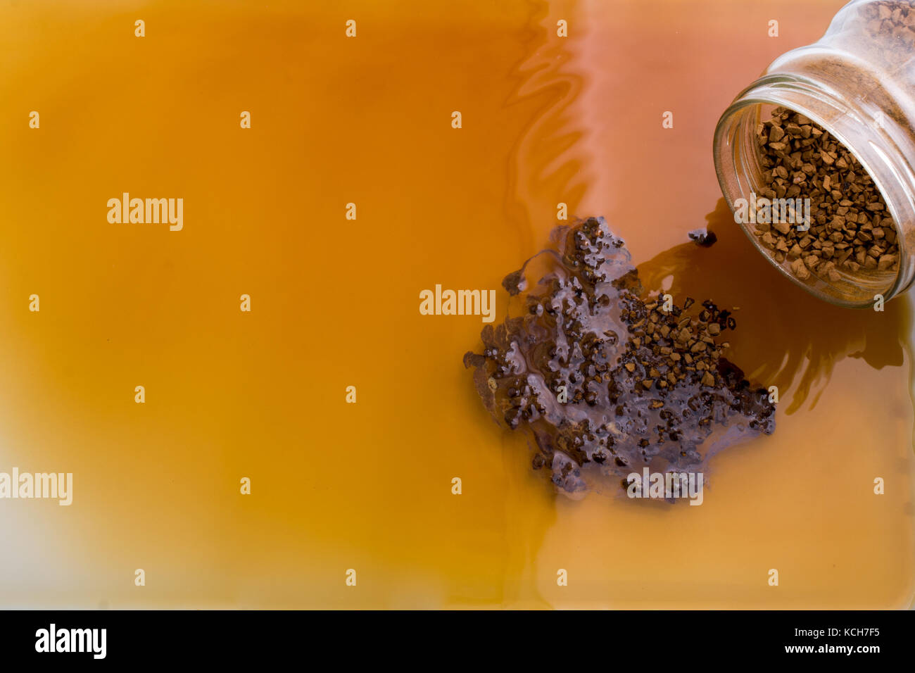 Coffe slowly dissolve in the hot water Stock Photo - Alamy