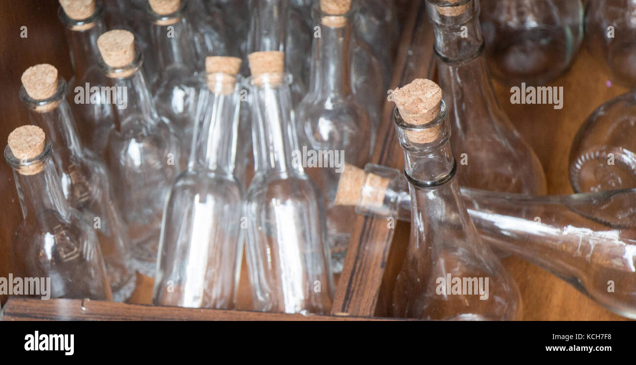 Set of Empty small transparent bottles in a box Stock Photo - Alamy