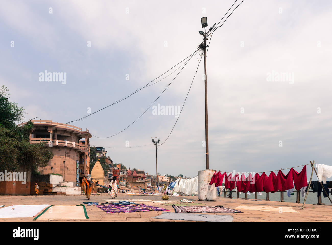 VARANASI, INDIA - MARCH 14, 2016: Wide angle picture clothes getting ...