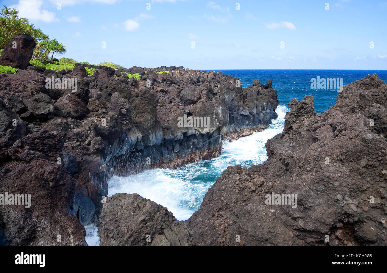 Waves and lava rocks at Wai'anapanapa State Park, Maui, Hawaii Stock ...