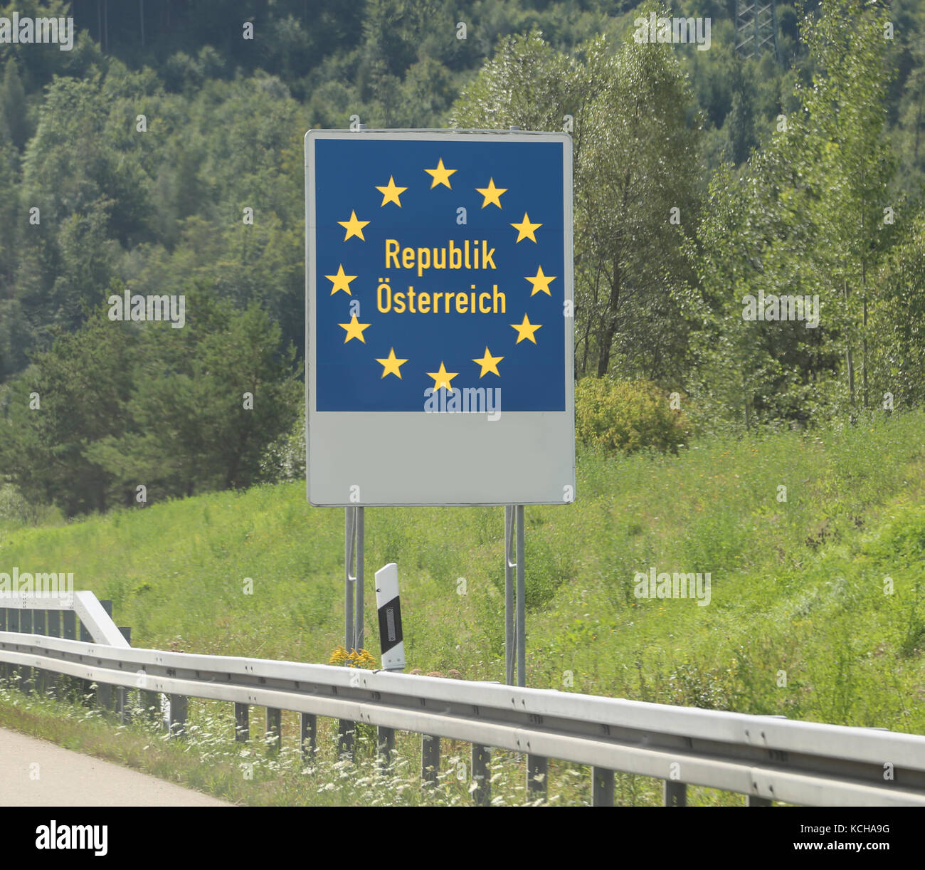 Austrian border and the road sign of the frontier with the stars of the ...