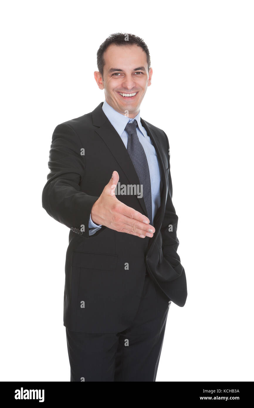 Photo Of Businessman Offering Handshake Over White Background Stock ...