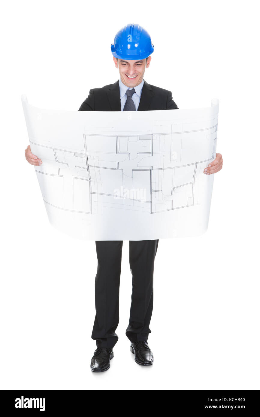 Businessman holding blueprints hi-res stock photography and images - Alamy
