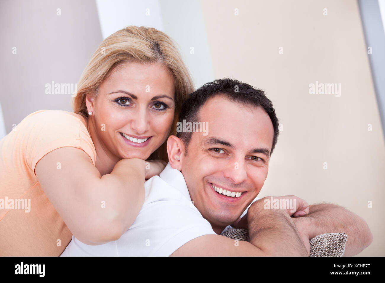 Portrait Of Mid-adult Happy Couple Smiling Together Stock Photo - Alamy