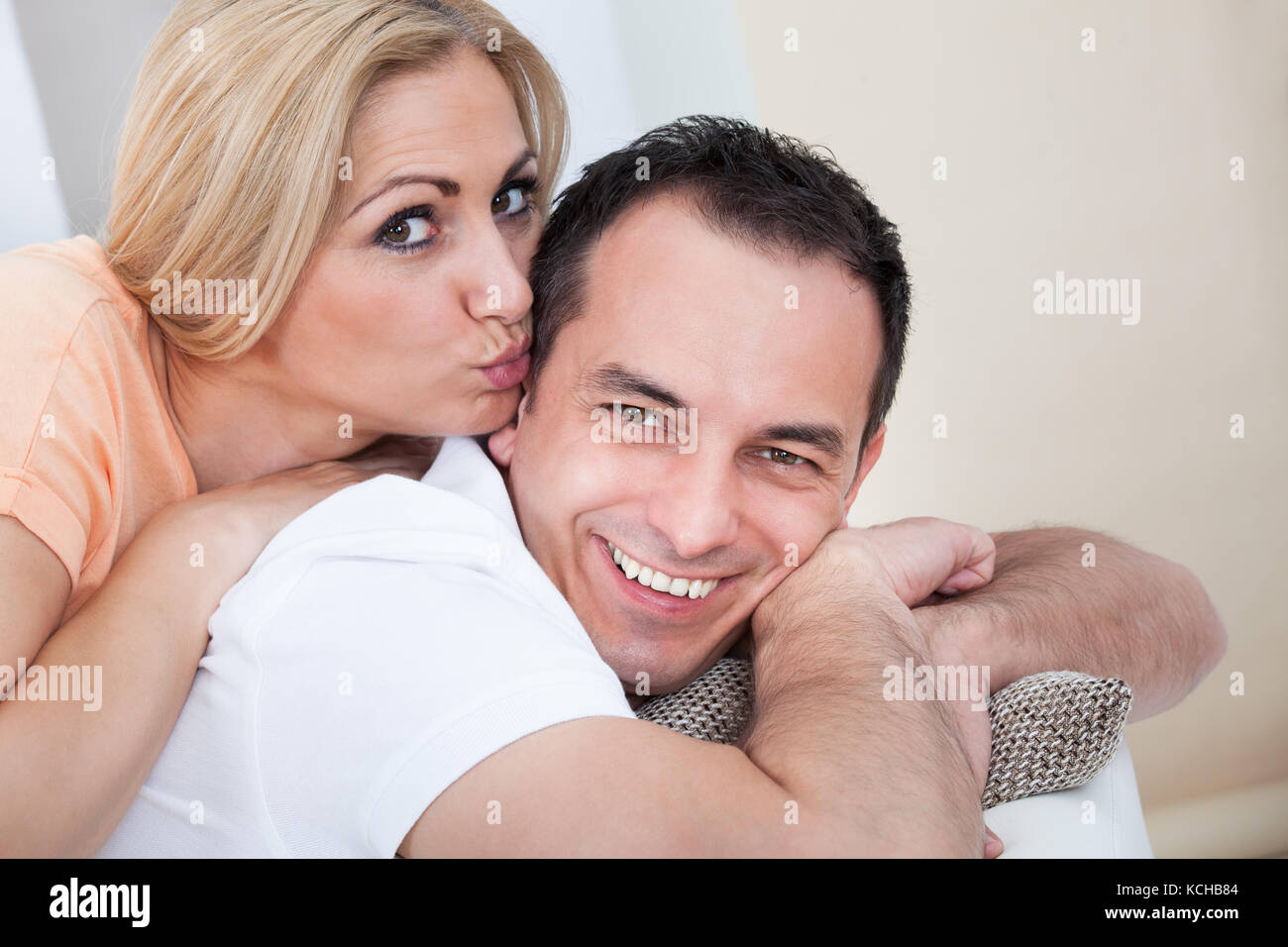 Couple Kiss Indoors Home Stock Photos & Couple Kiss Indoors Home Stock ...