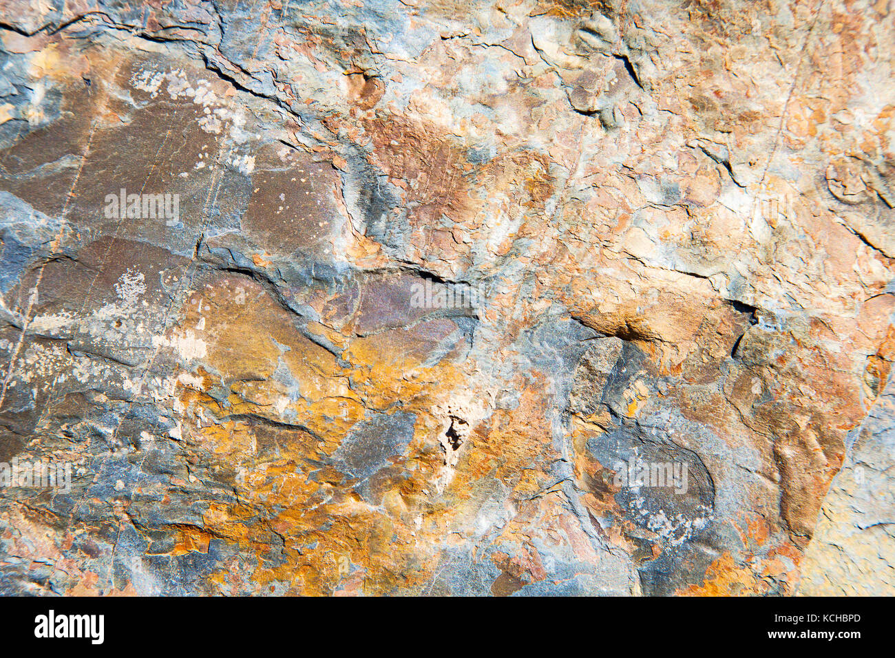 rocks stone and red orange gneiss in the wall of morocco Stock Photo ...