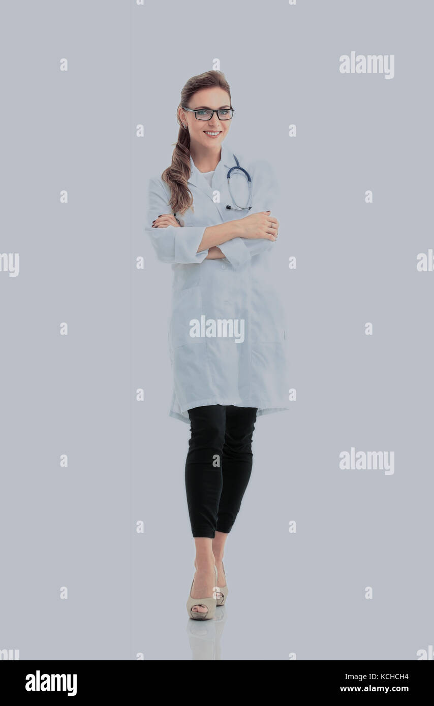 Happy female doctor smiling and folding arms isolated on white Stock Photo - Alamy