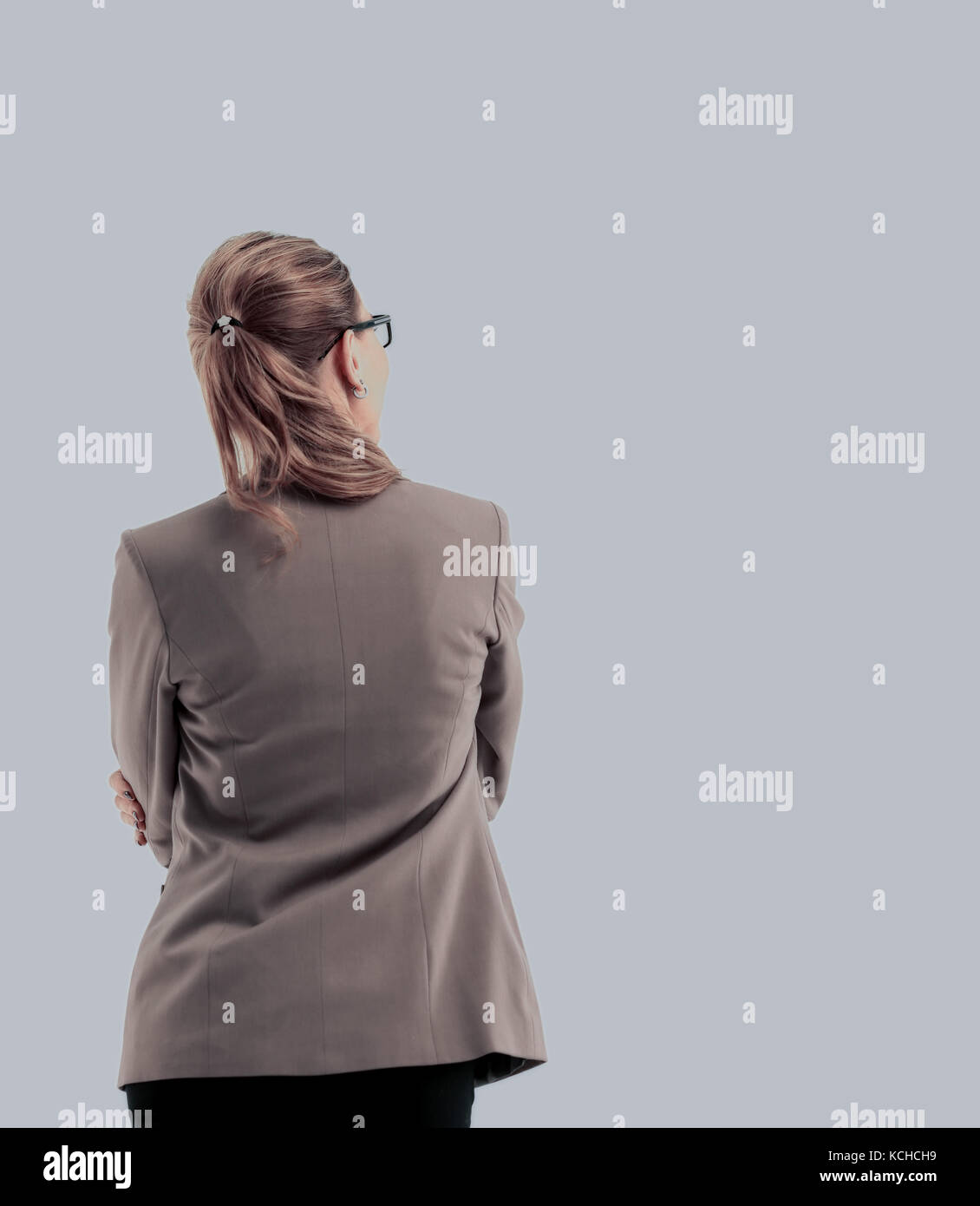 Business woman stand back side with white wall background Stock Photo ...