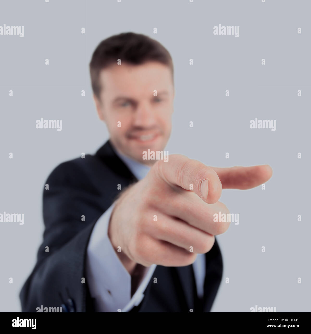 Handsome man points his finger at you Stock Photo - Alamy