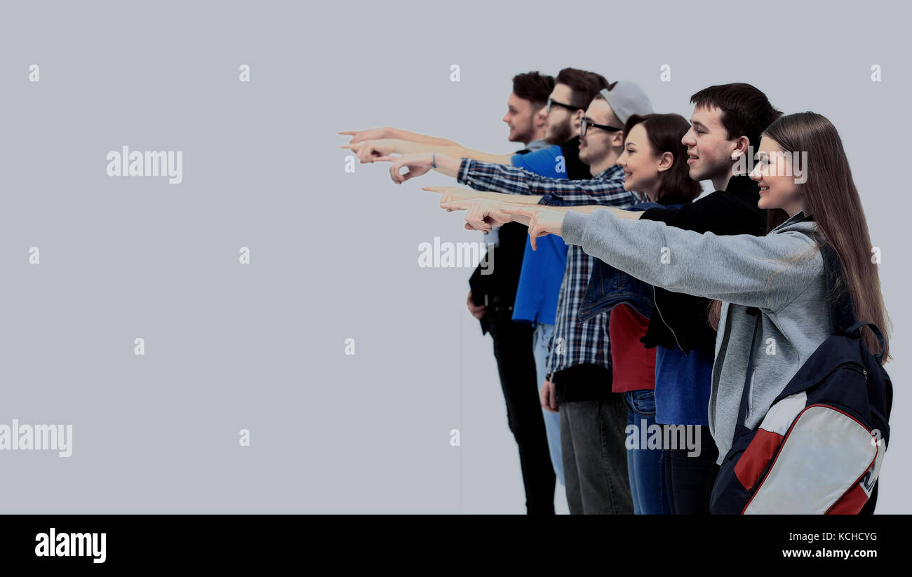 group of young people pointing at something Stock Photo - Alamy