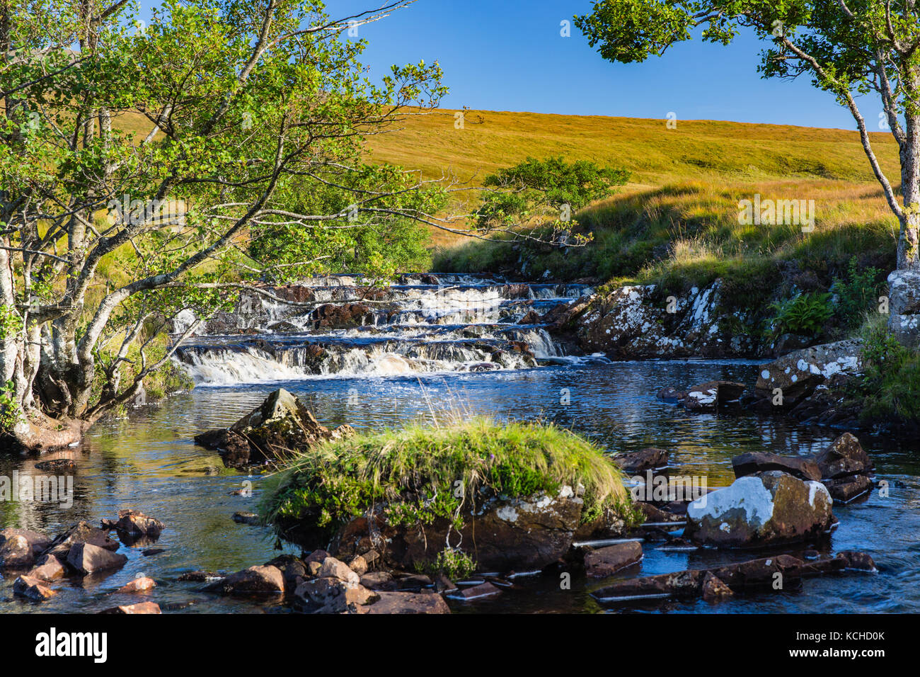 Stream in the highlands of Scotland fowing across moorland Stock Photo ...
