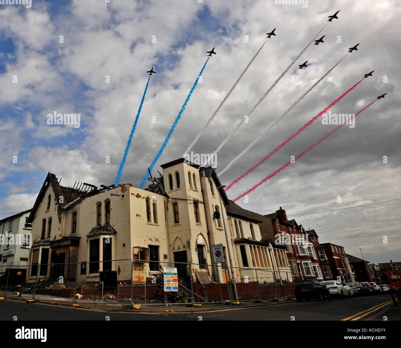 Red Arrows over a derelict building approaching Blackpool' shore Stock ...