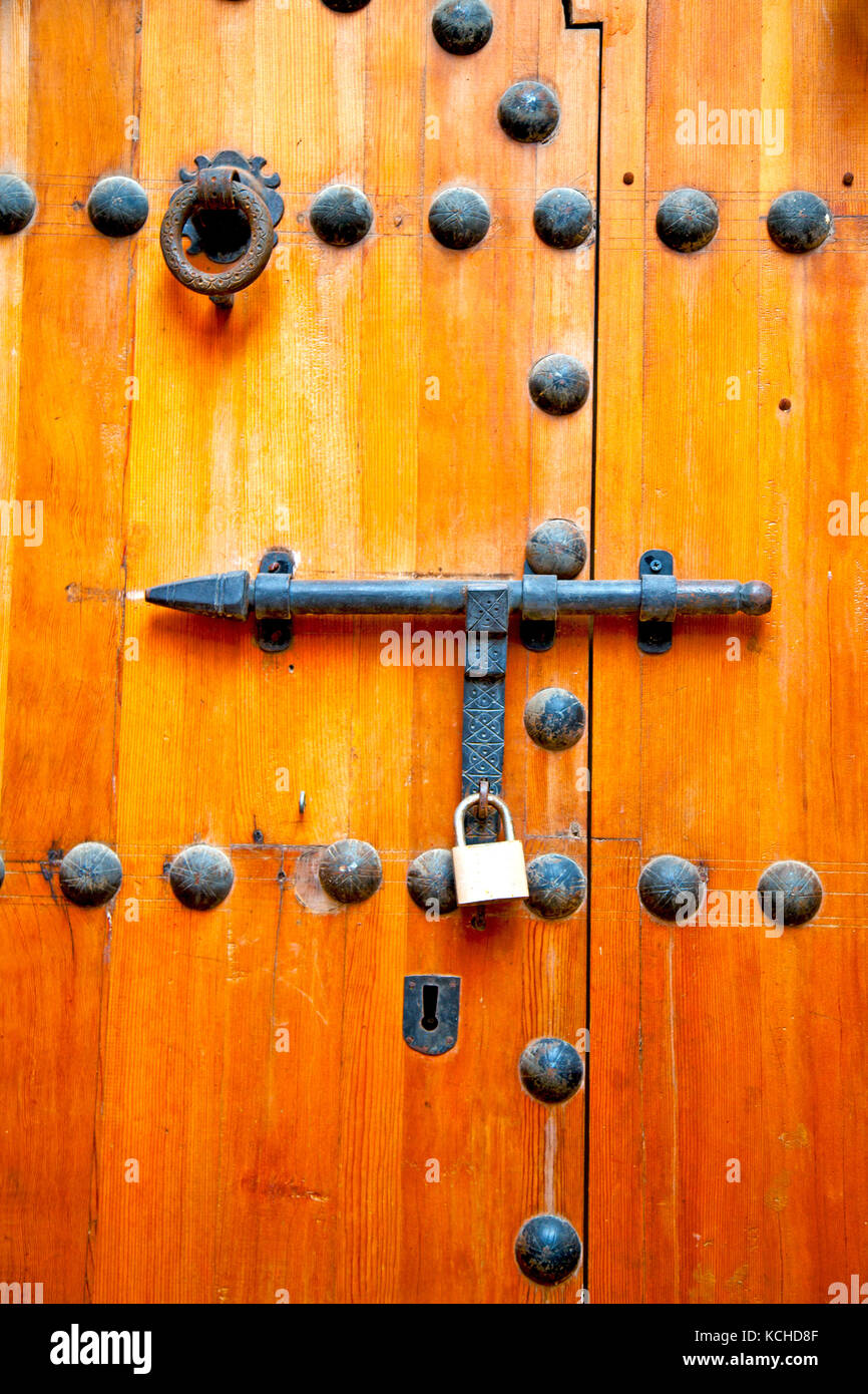 brown morocco in africa the old wood facade home and rusty safe padlock ...