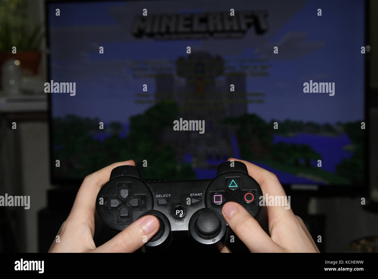 Hand holding playstation controller hi-res stock photography and images ...