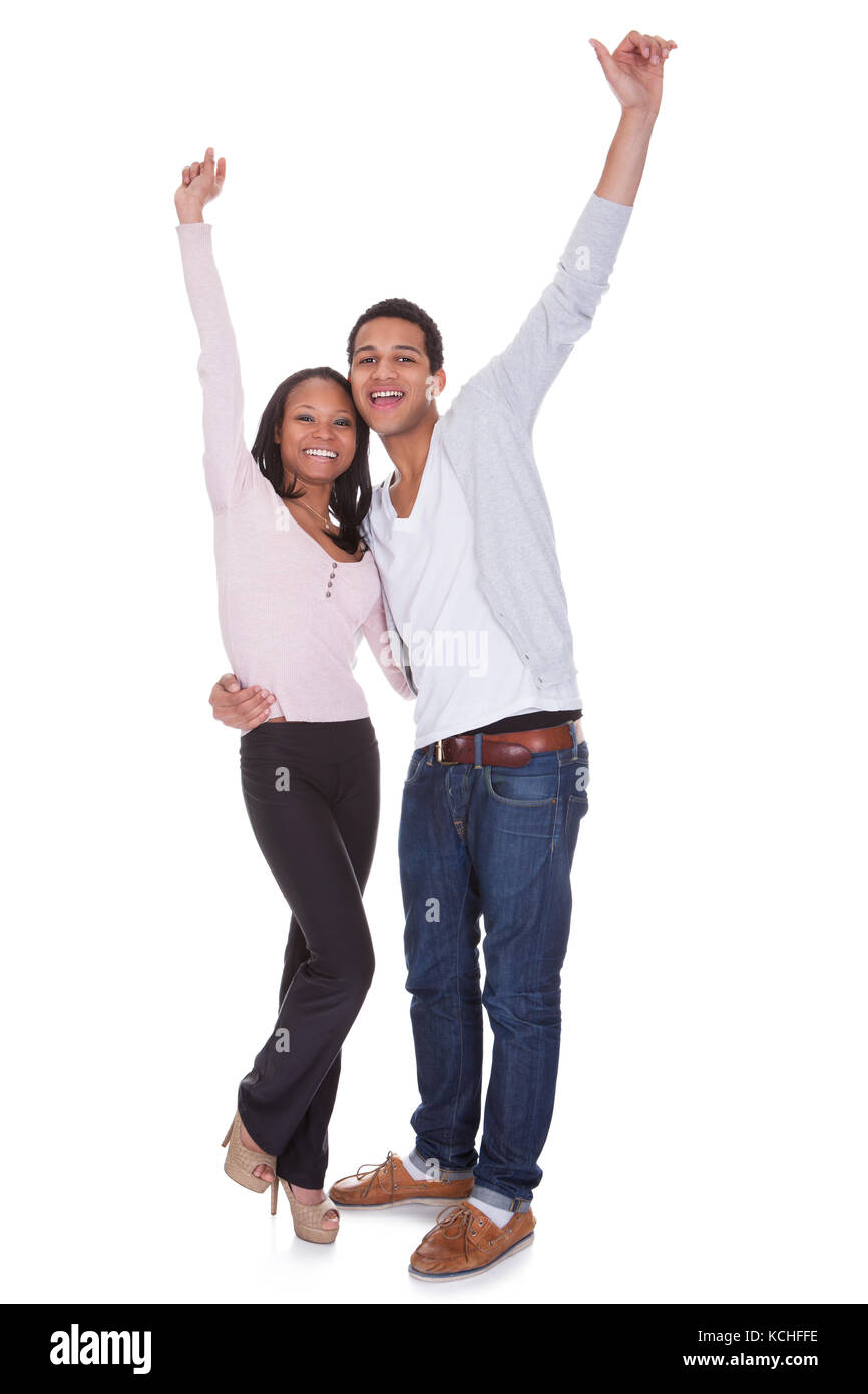 Happy Couple Raising Hand Over White Background Stock Photo - Alamy