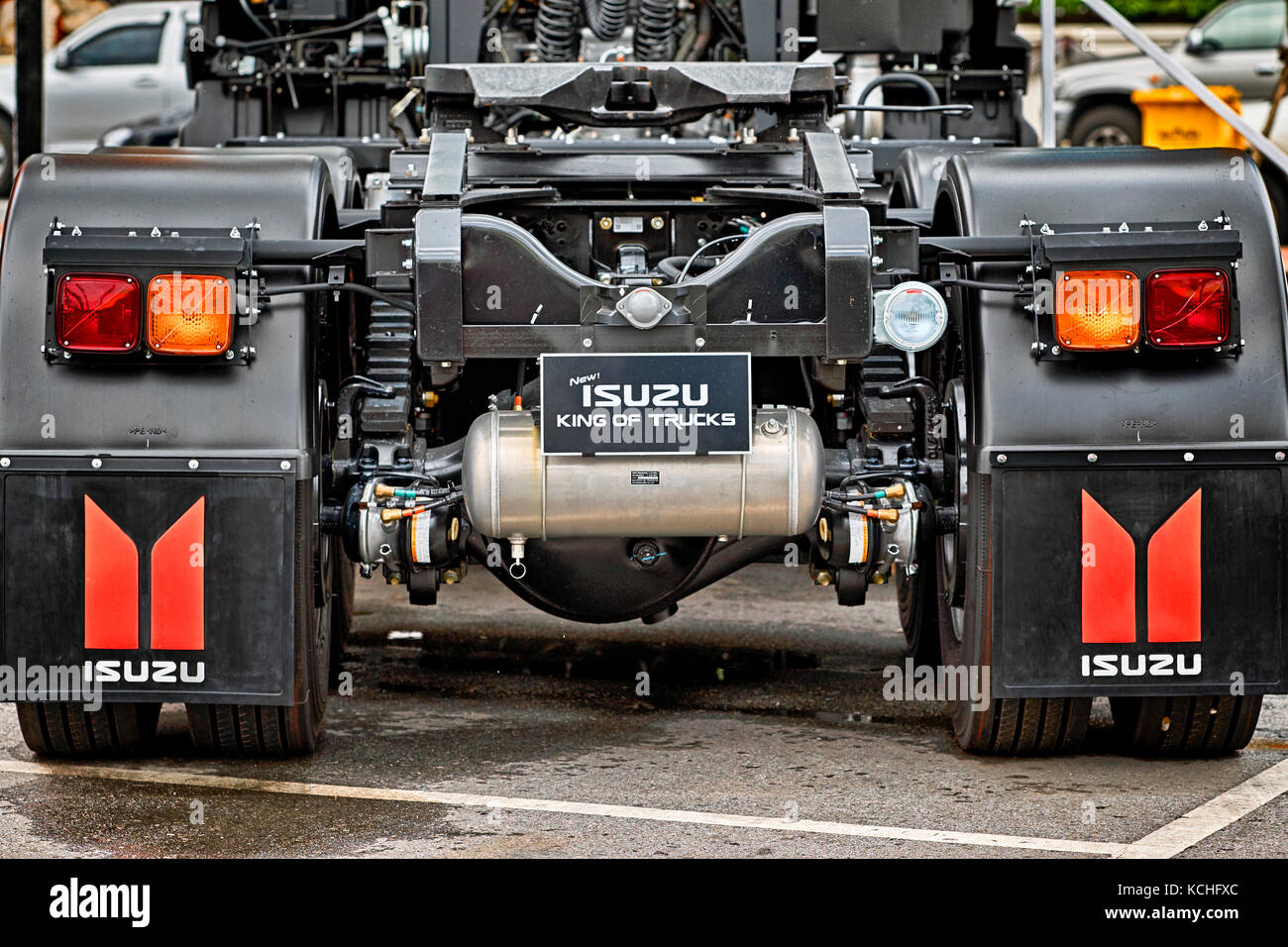 Detail of a new modern Isuzu large 6 wheeled truck. Rear view Stock ...