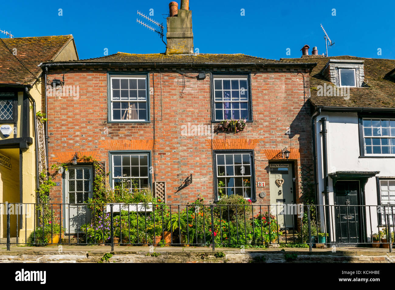 Period cottages on quaint British high stree Stock Photo - Alamy