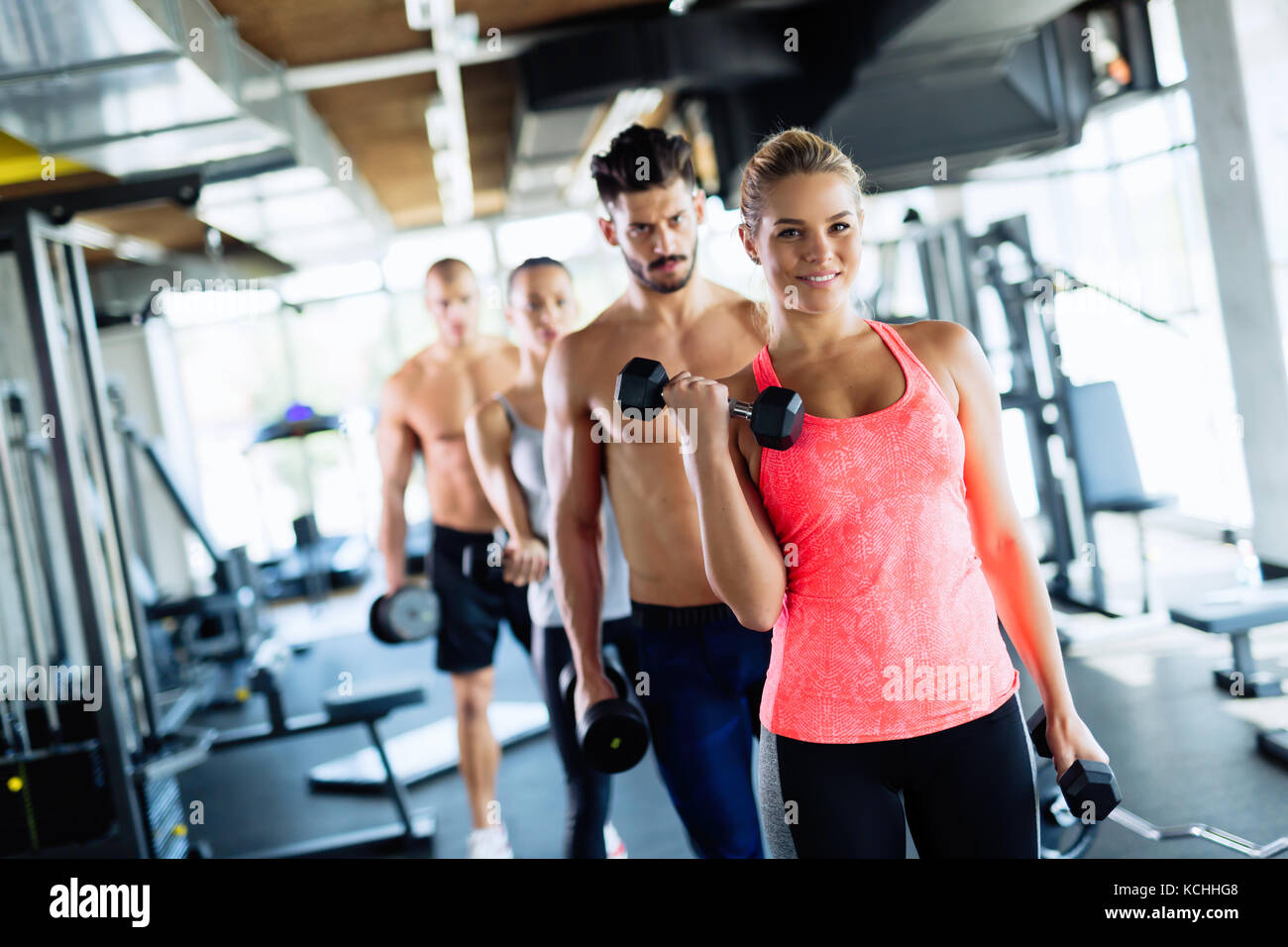 Group of people have workout in gym Stock Photo - Alamy