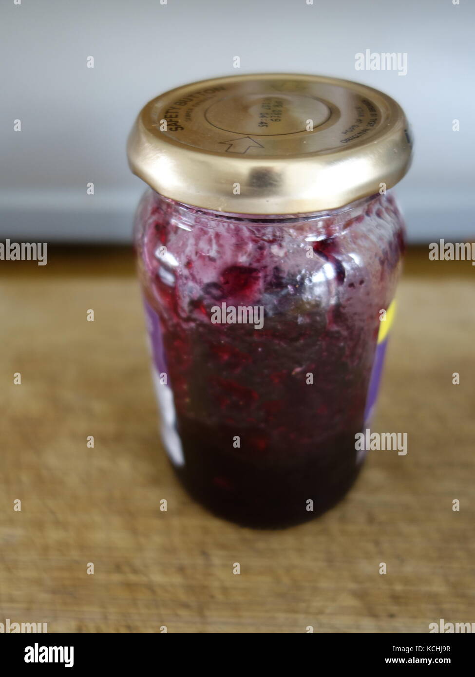 A half ful jam jar Stock Photo - Alamy