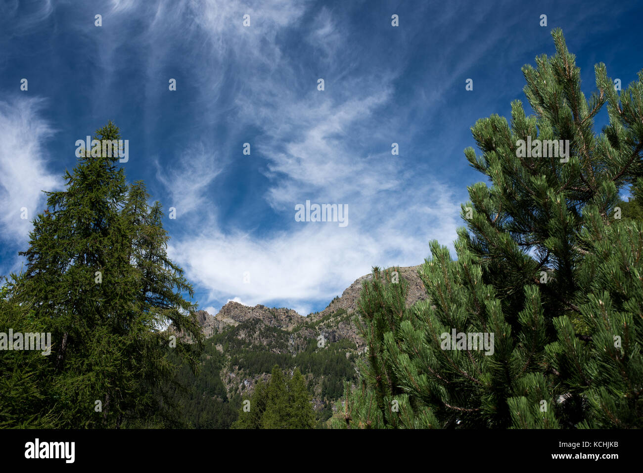 Cirrus Intortus, type of clouds in a mountains landscape Stock Photo ...