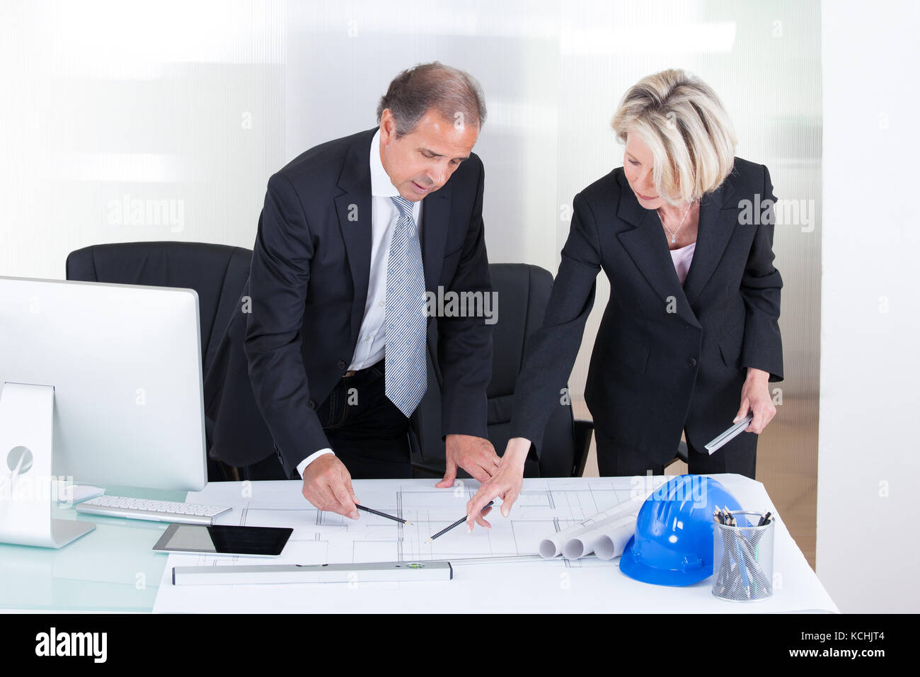 Two engineers plans hi-res stock photography and images - Alamy