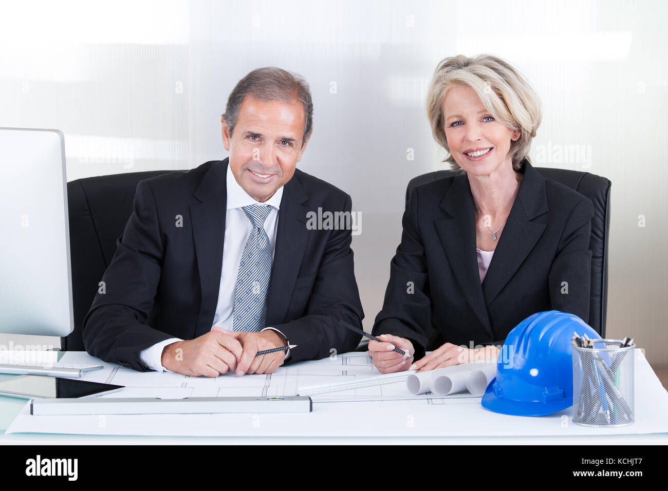 Two engineers plans hi-res stock photography and images - Alamy