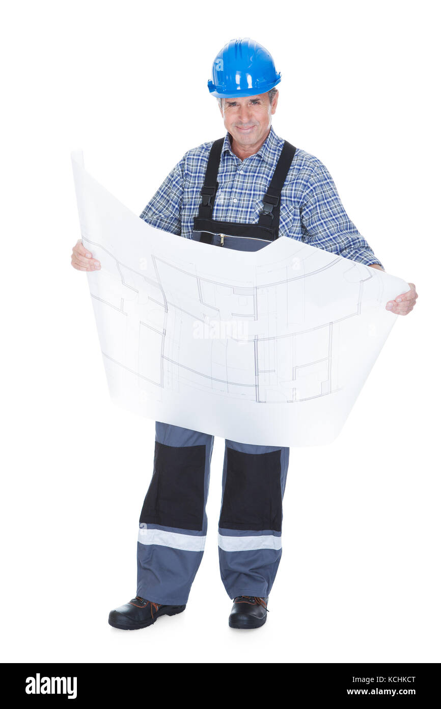 Male Architect Holding Blueprint Over White Background Stock Photo - Alamy