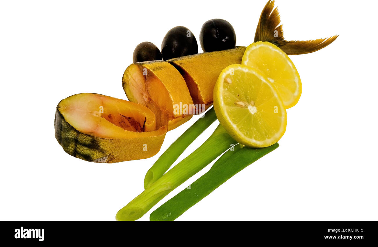 Smoked sardine sliced with a green onions and a lemon Stock Photo - Alamy