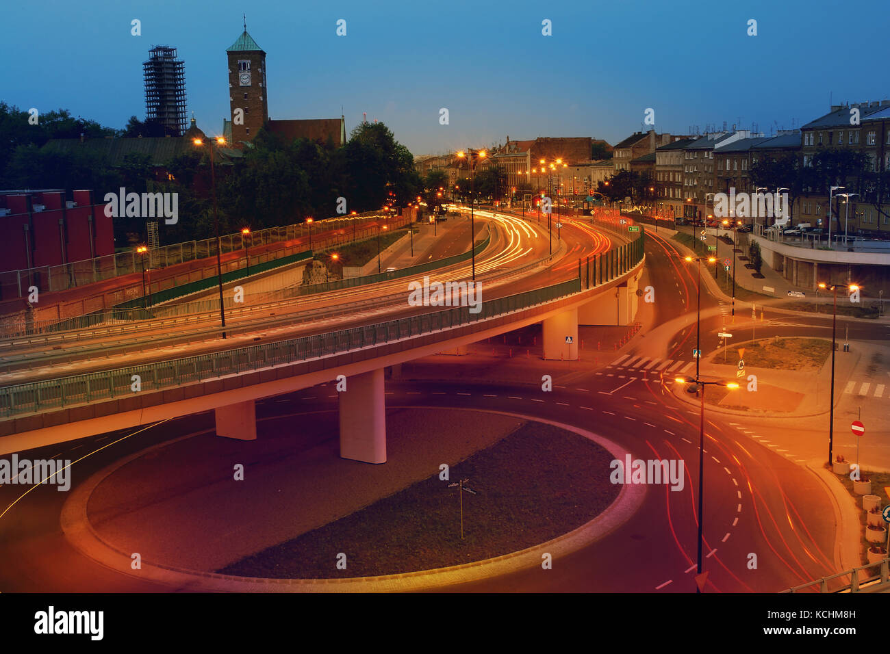 Night traffic light trails created by vehicles moving on two-level ...