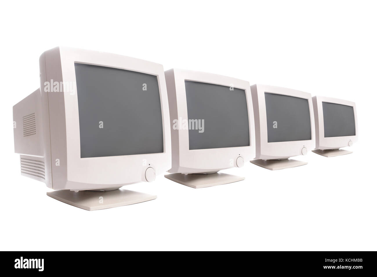Line of four CTR monitors over white background Stock Photo - Alamy