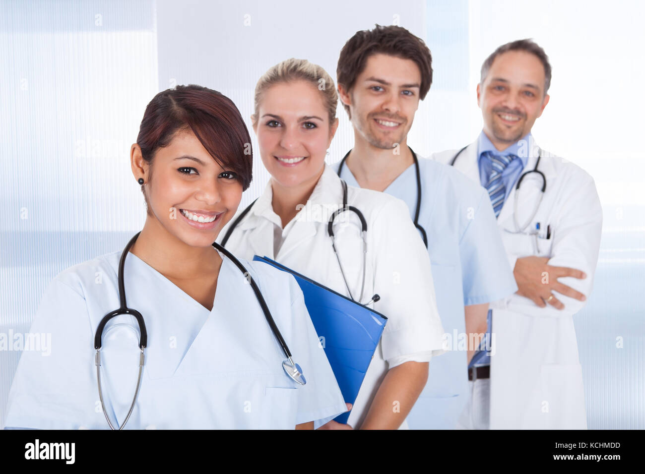 Group of doctors standing together at the clinic Stock Photo - Alamy
