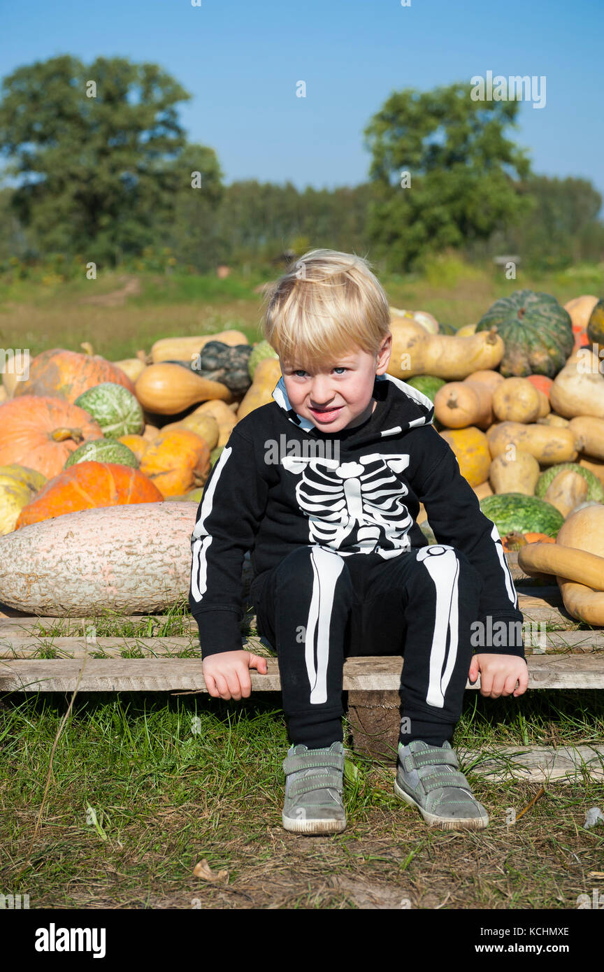 Boy wearing skeleton costume Stock Photo - Alamy