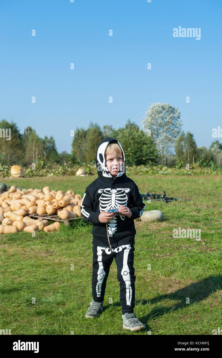 Boy wearing skeleton costume Stock Photo - Alamy