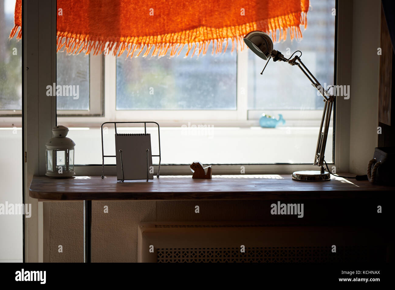 High countertop window sill, table lamp.A cozy place for reading Stock ...