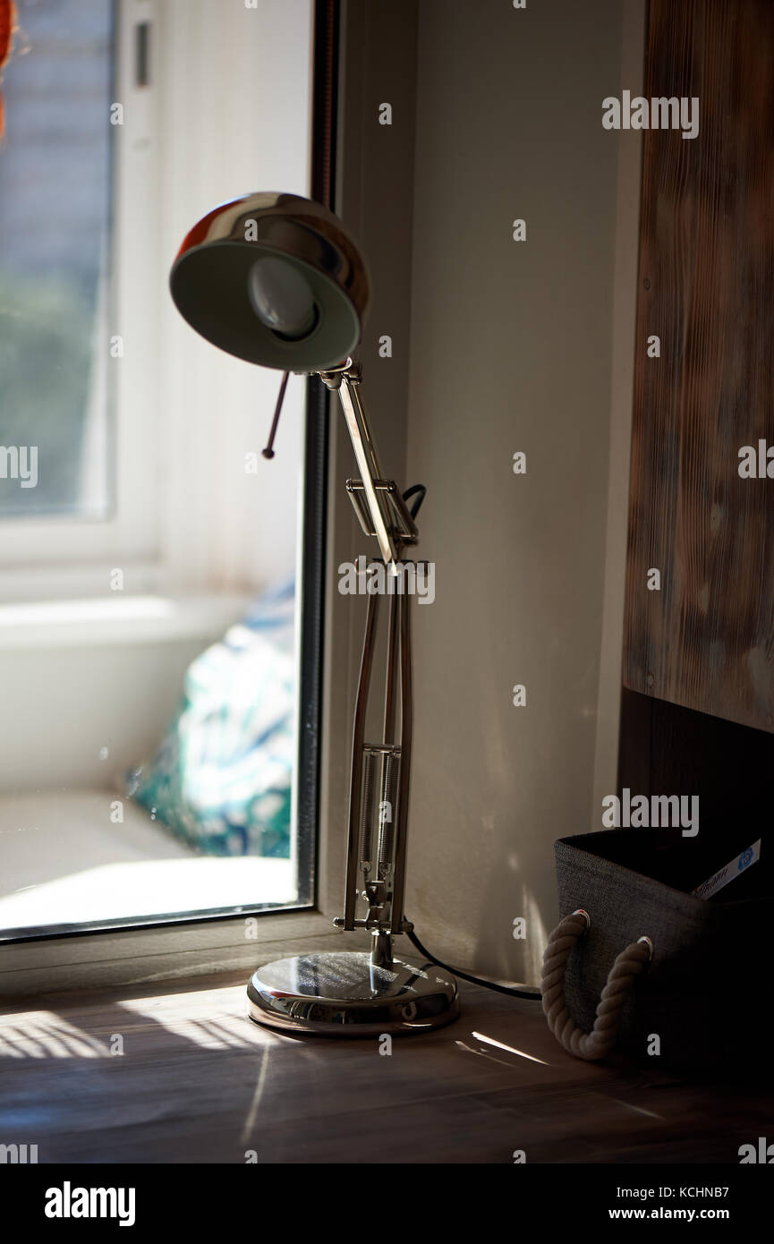High countertop window sill, table lamp.A cozy place for reading Stock ...