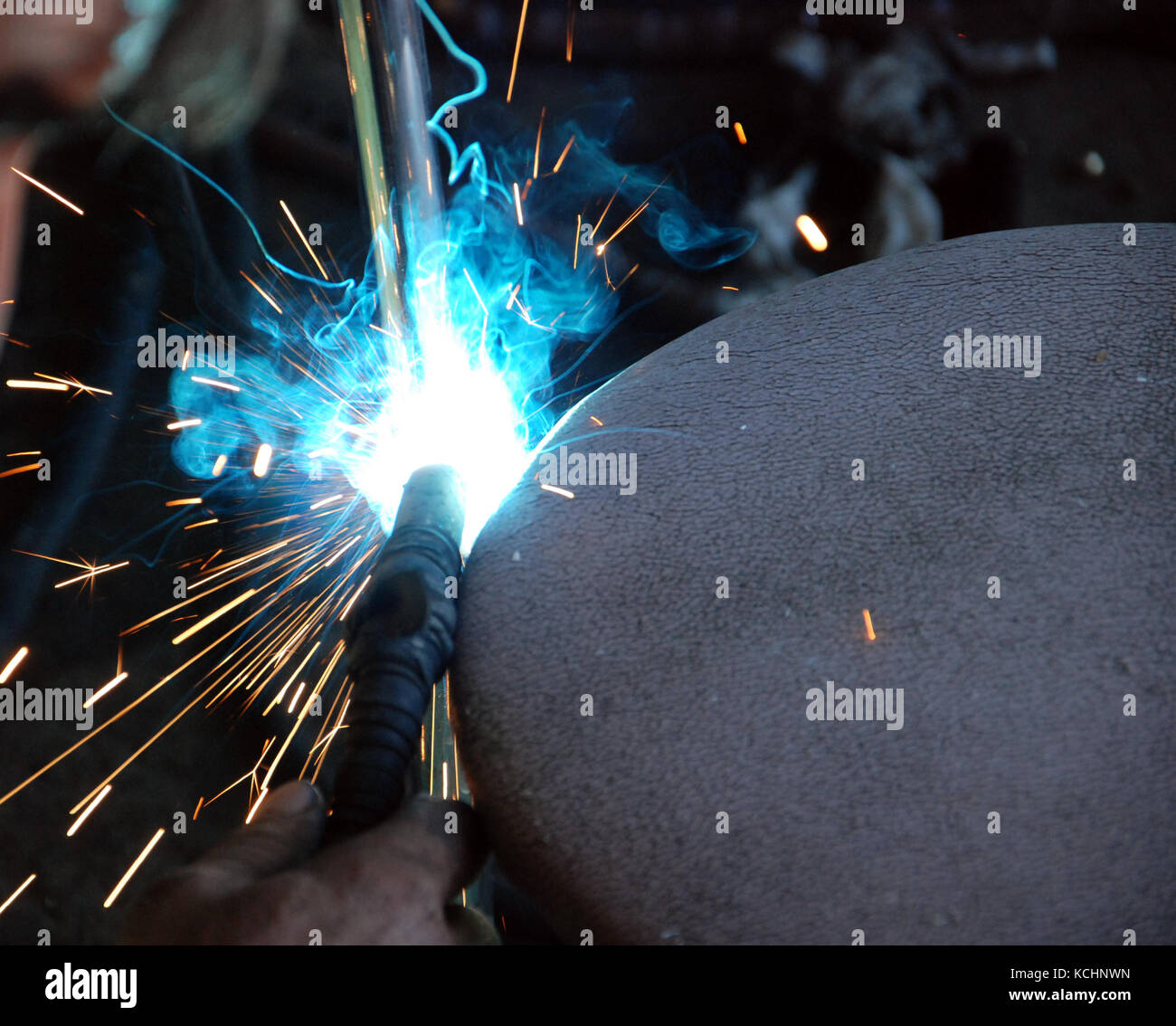 picture of a process of welding. sparks and heat Stock Photo - Alamy