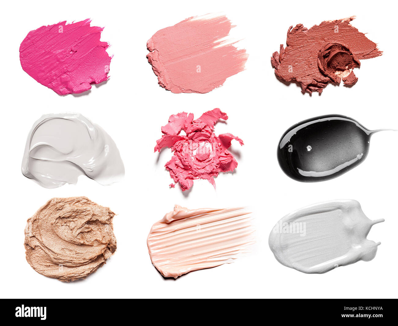 cosmetic products smear paint of crushed cosmetic on a white background ...