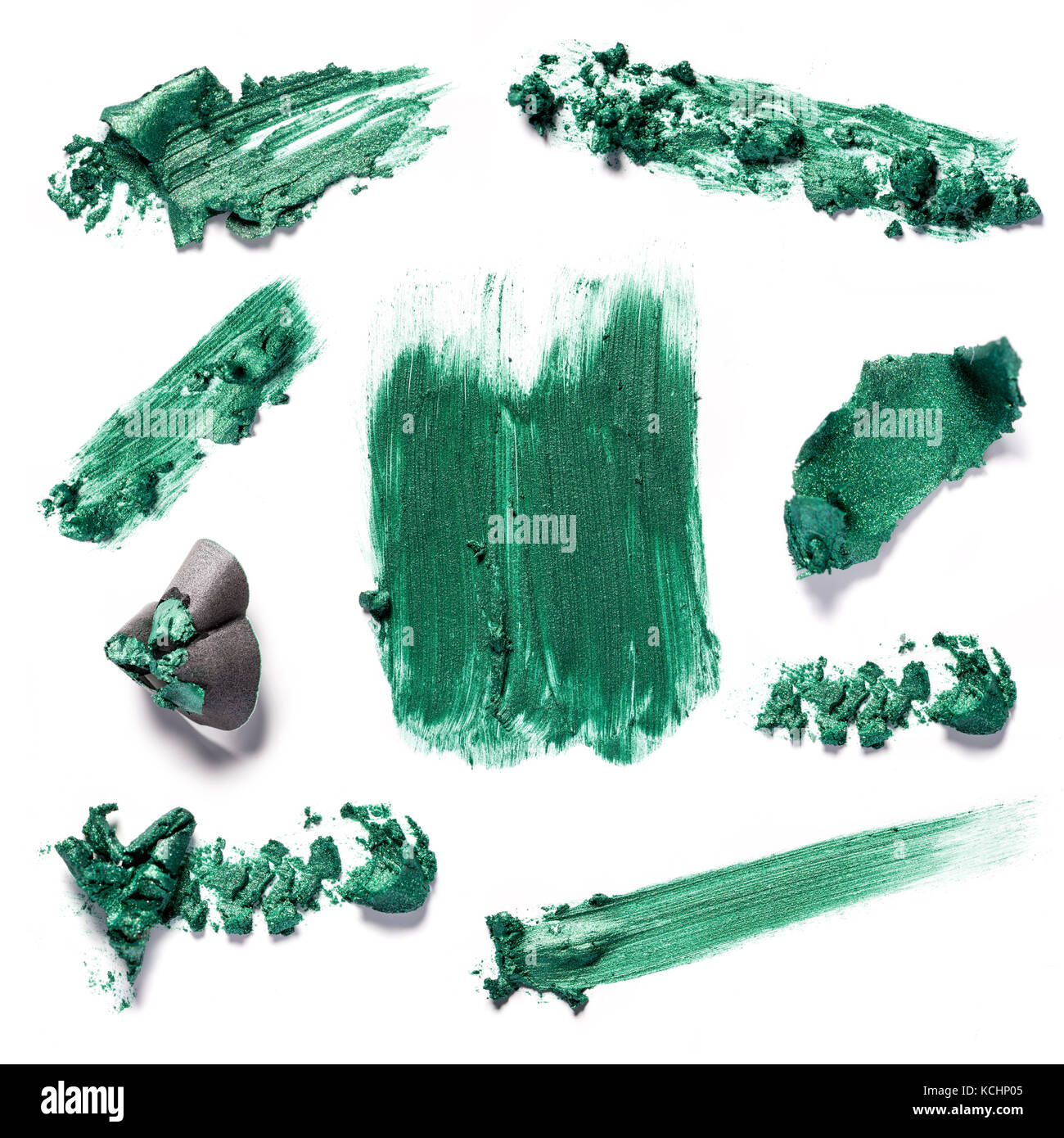 cosmetic products smear paint of crushed cosmetic on a white background ...