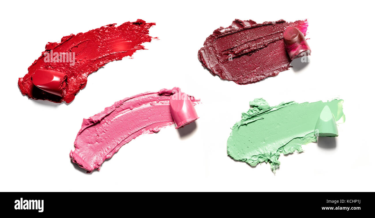 cosmetic products smear paint of crushed cosmetic on a white background ...