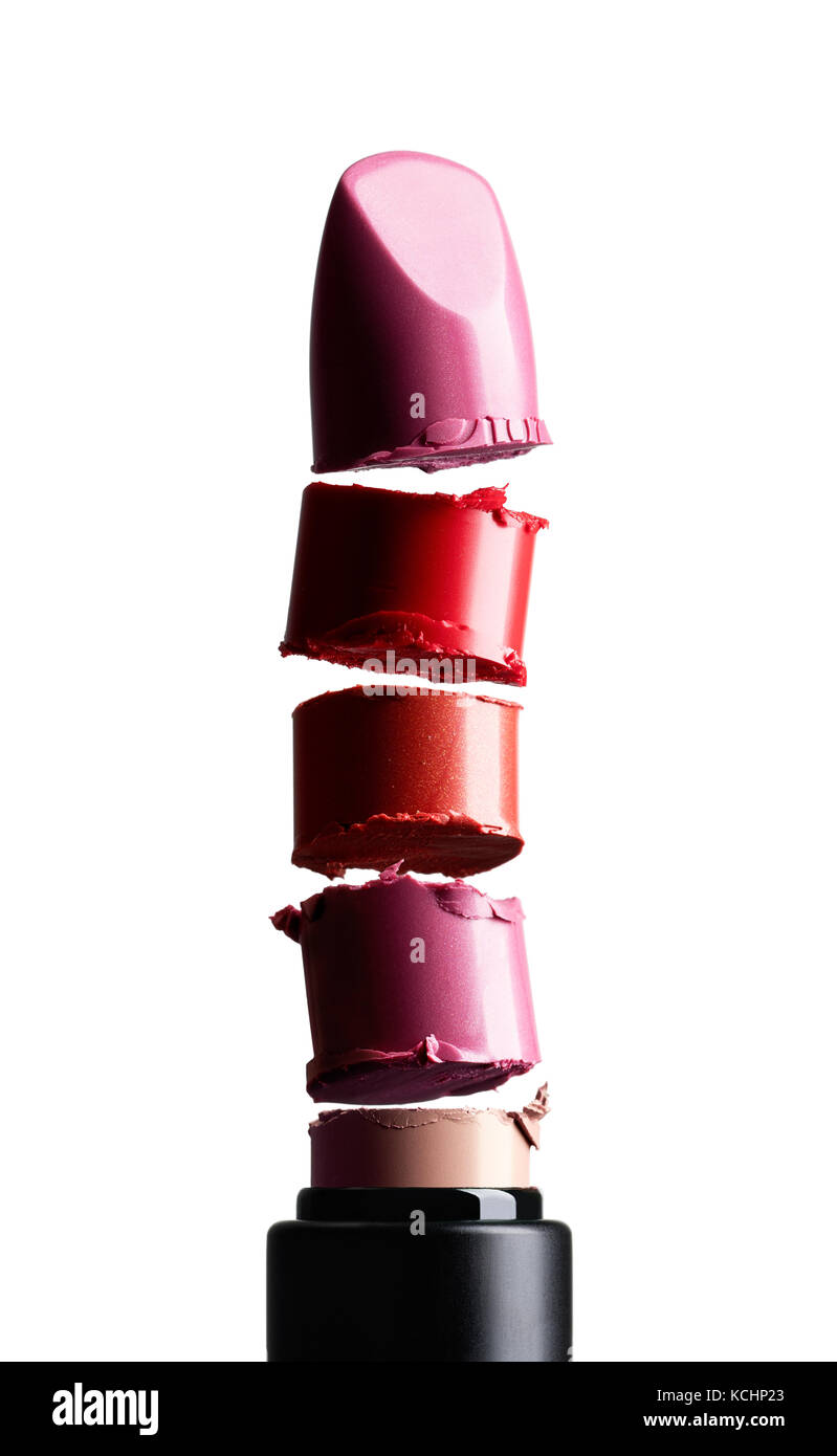 lipstick of different pieces of broken lipstick. Concept on a white ...