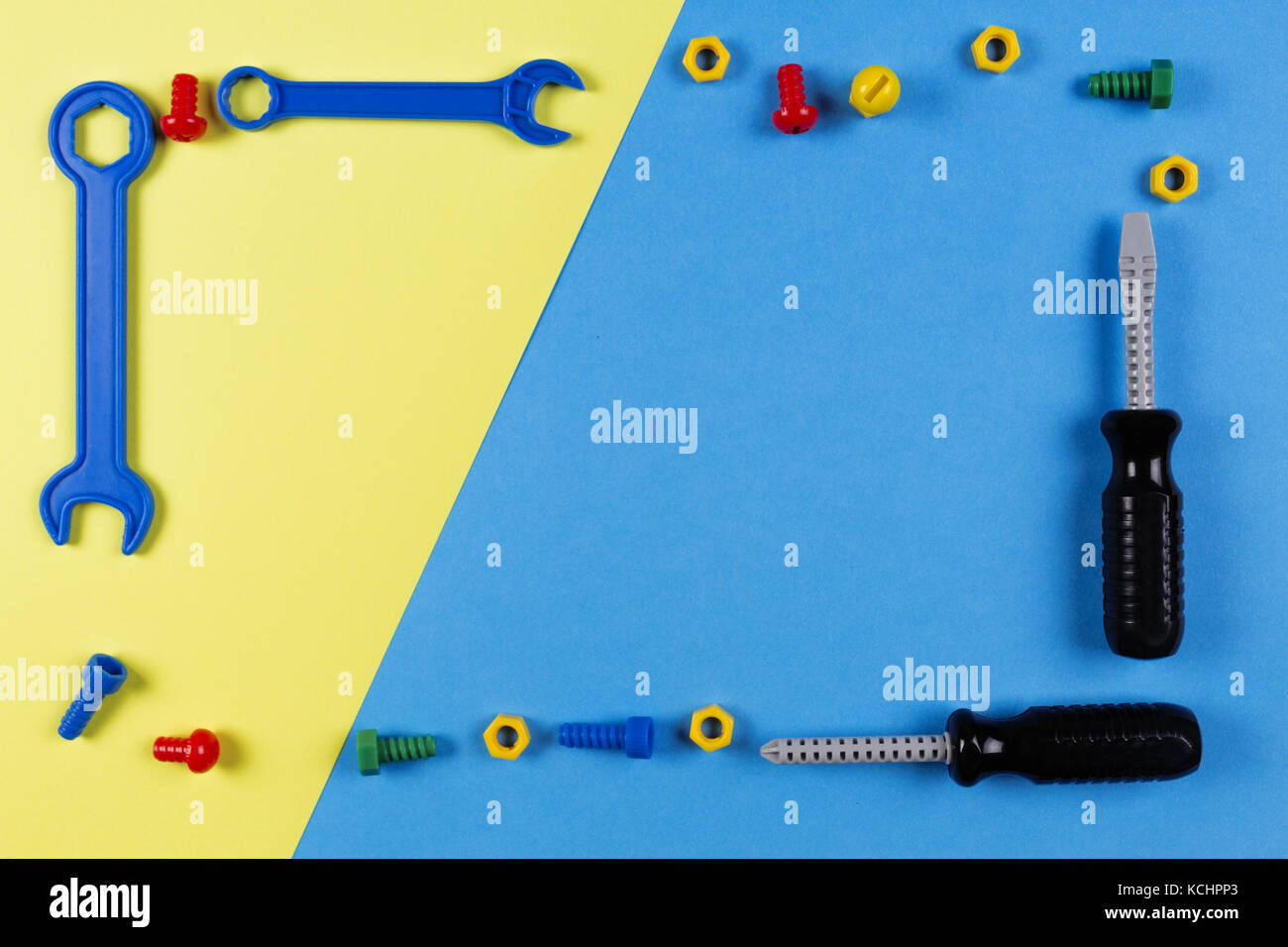 Toys background. Kids construction toys tools frame with screwdrivers ...