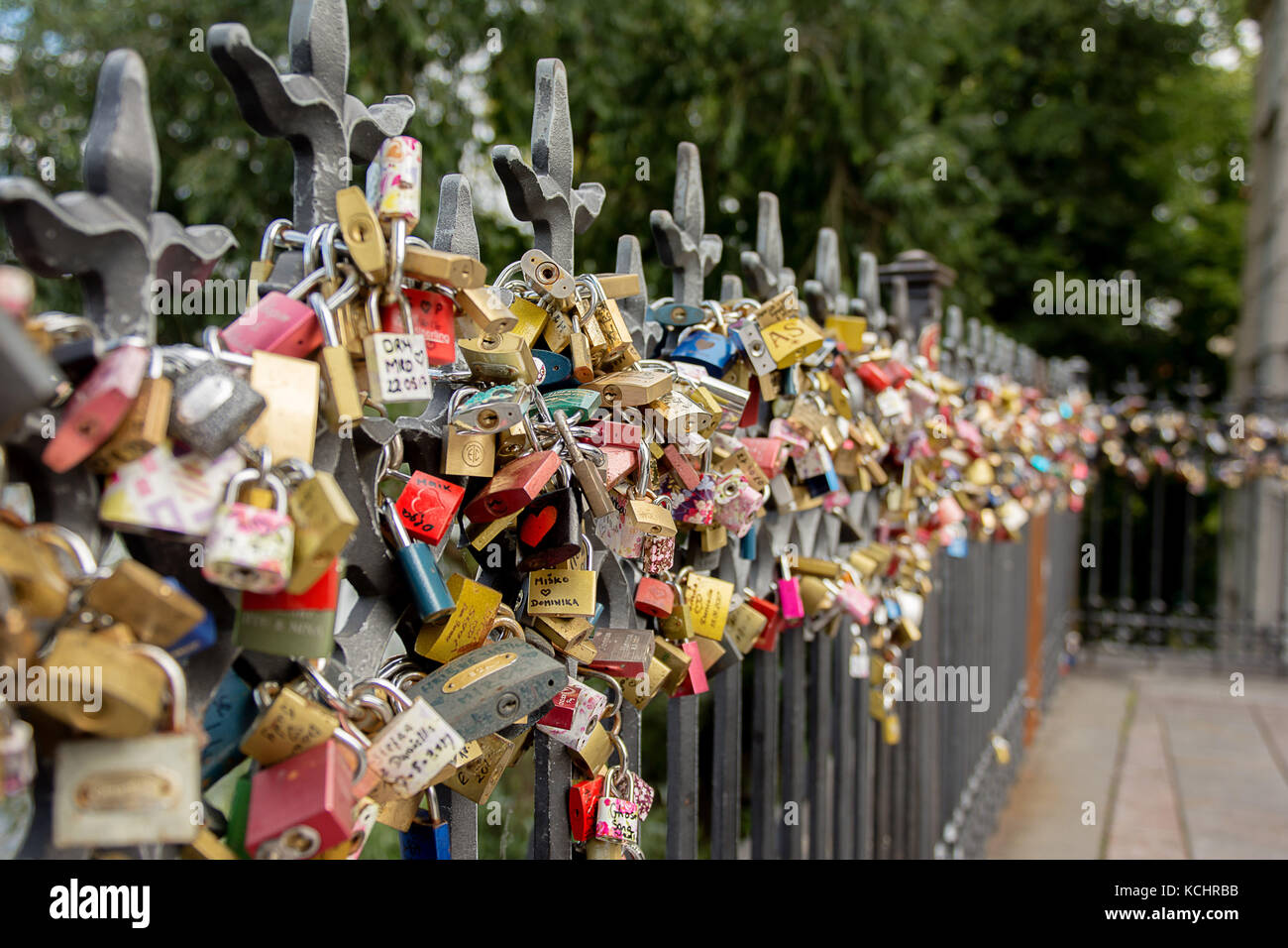 personalised engraved love locks on a bridge where young in love ...